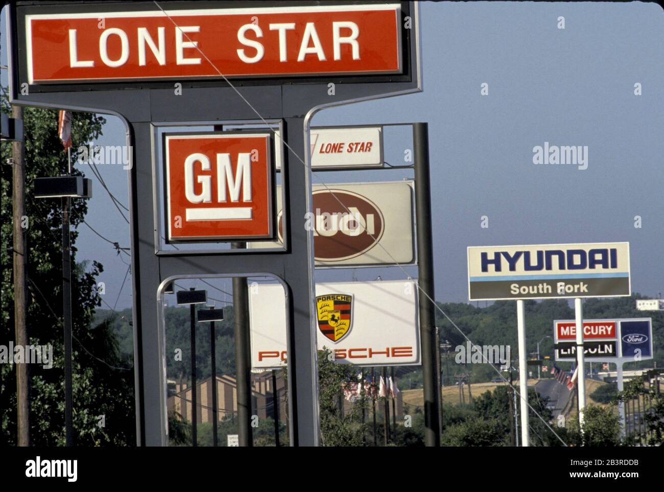 Austin, Texas USA: Roadside signs for car companies along the "Motor ...