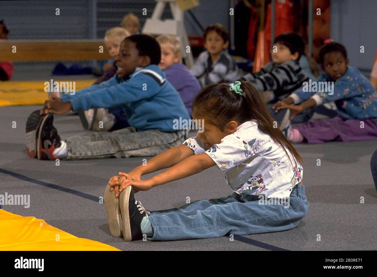 Austin Texas USA: Kindergarten students stretch to touch their toes ...