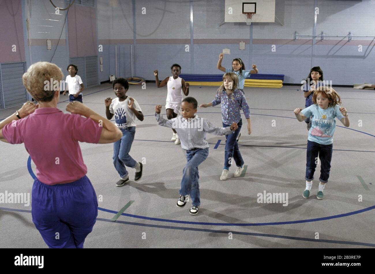 Austin, Texas USA: Physical education teacher leads elementary school ...
