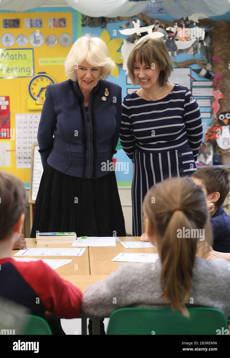 The Duchess of Cornwall (left), with headteacher Helen Swain, speaking ...