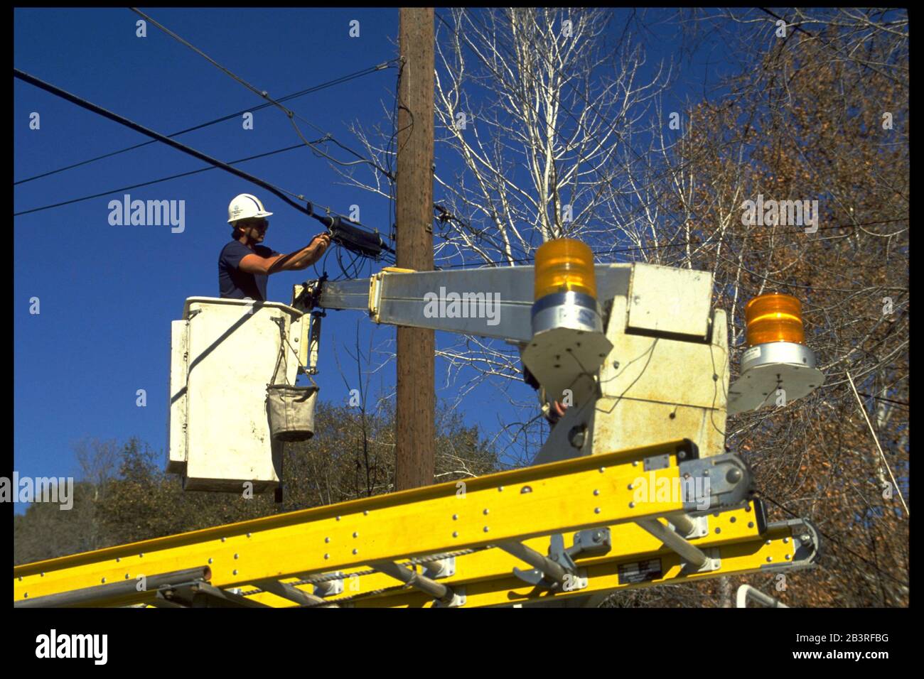 Telephone pole worker hi-res stock photography and images - Alamy