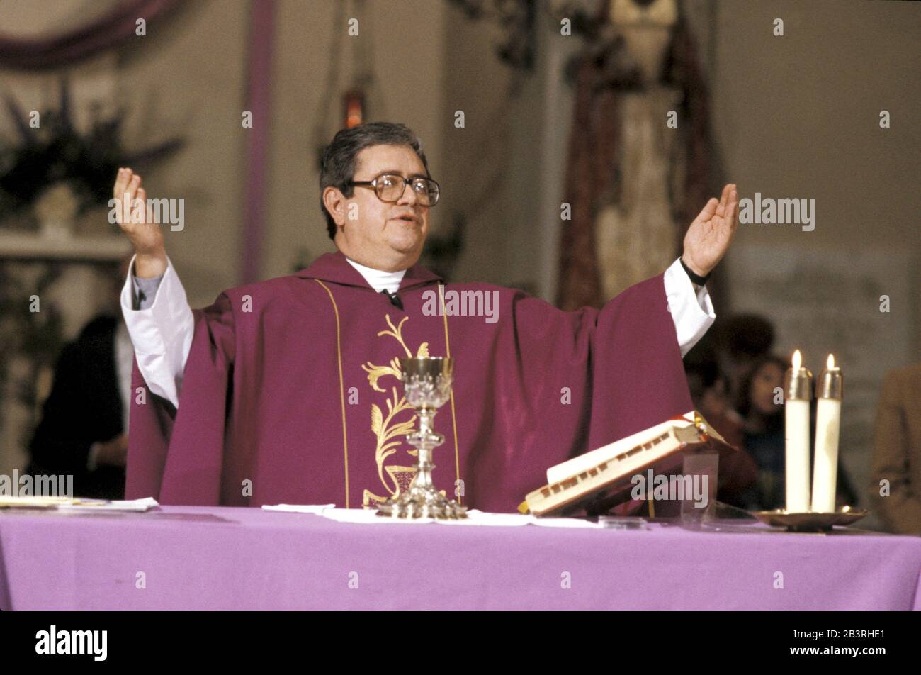 San Antonio, Texas, circa 1990: Roman Catholic priest at altar during ...