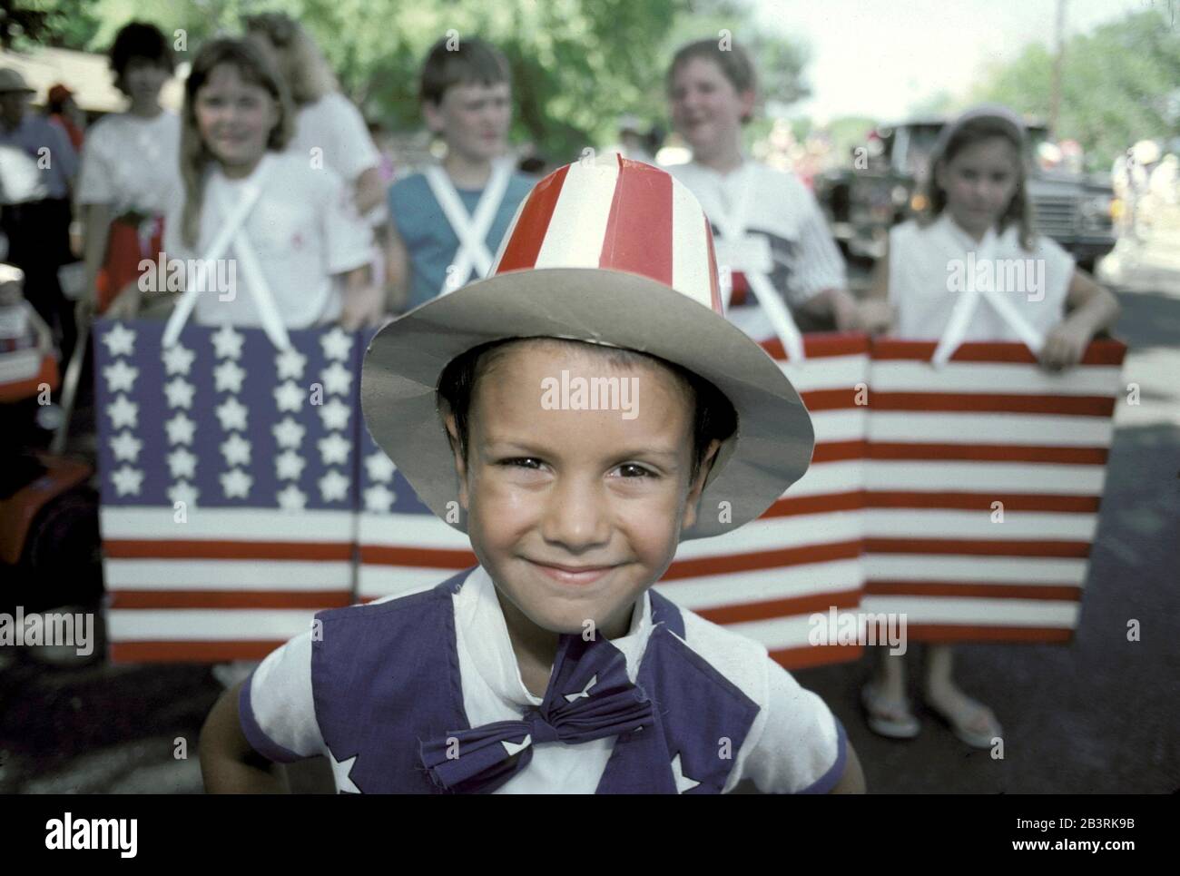 Austin Texas USA, circa 1994: Young boy in Uncle Sam-style hat poses in ...