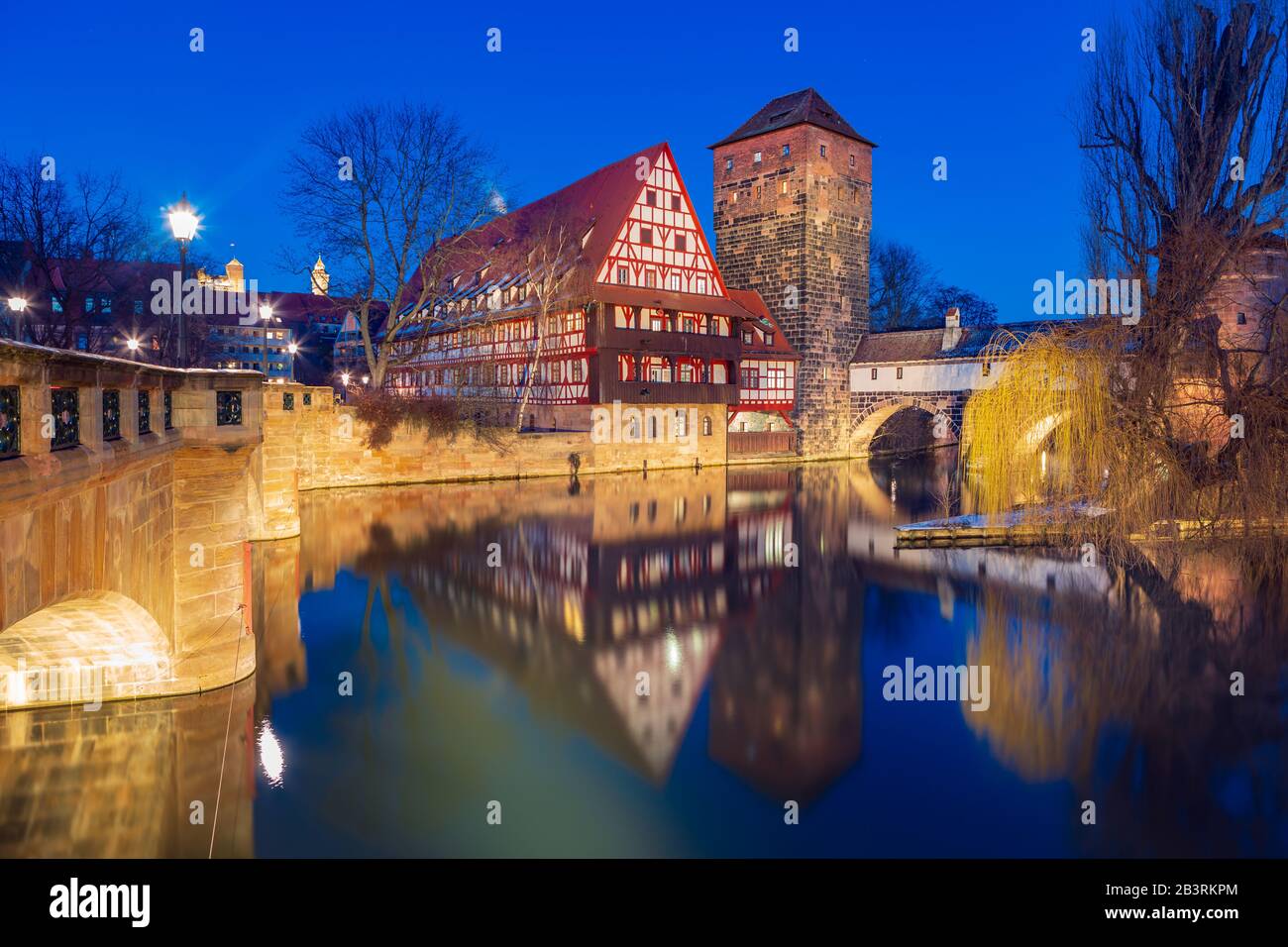The riverside of Pegnitz river in Nuremberg town by night, Germany ...