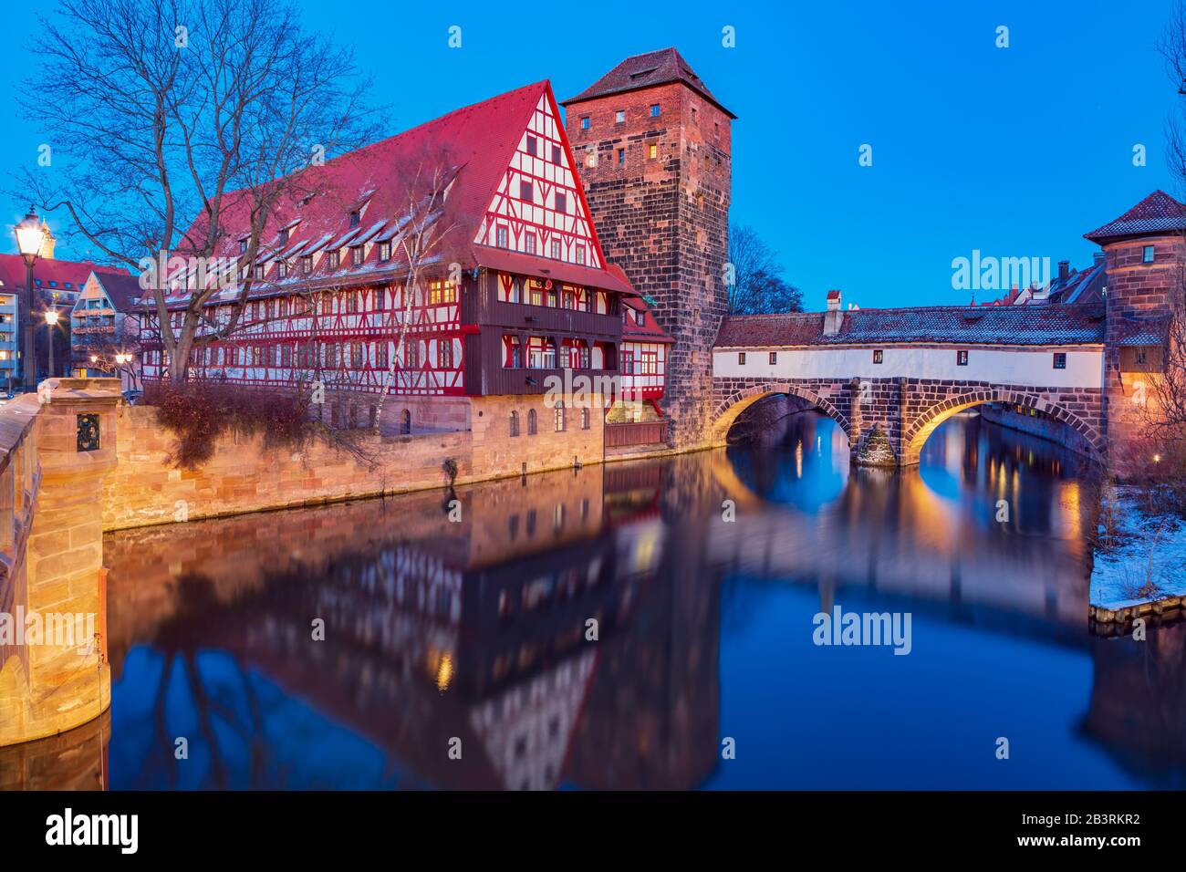 The riverside of Pegnitz river in Nuremberg town by night, Germany ...