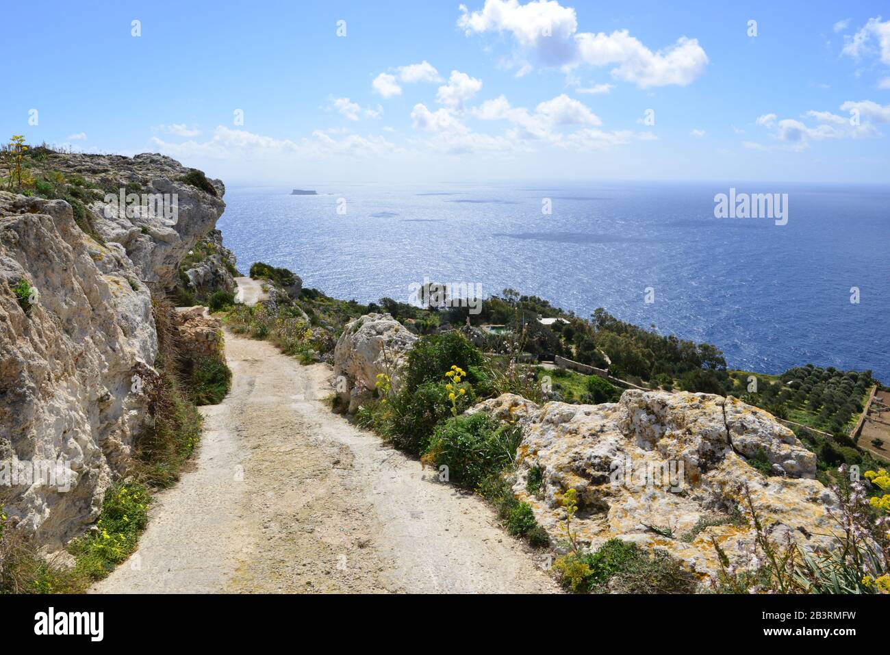 A narrow cliff path on the Dingli cliffs in Malta Stock Photo - Alamy