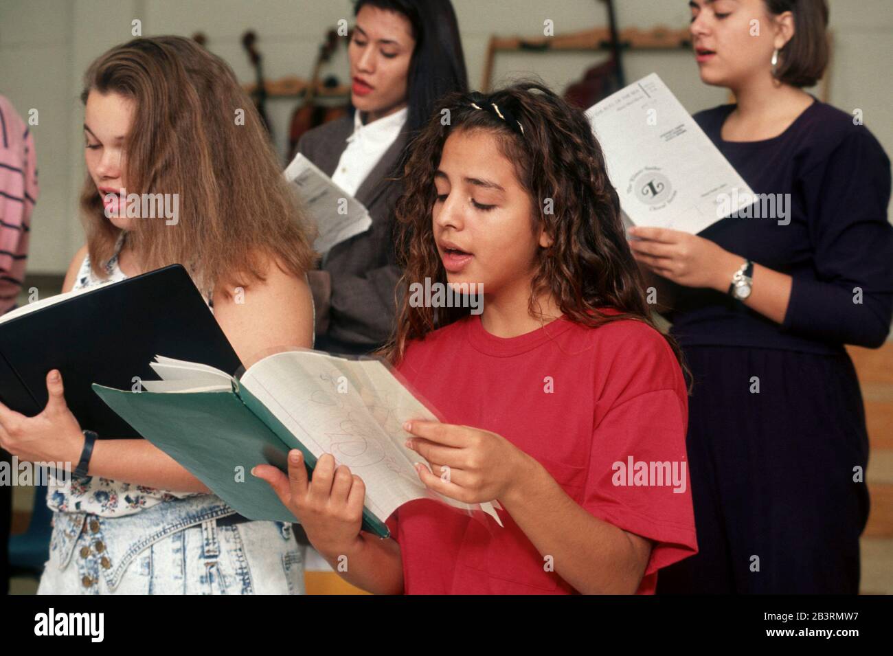 Austin, Texas USA: Female high school choir members rehearse for ...