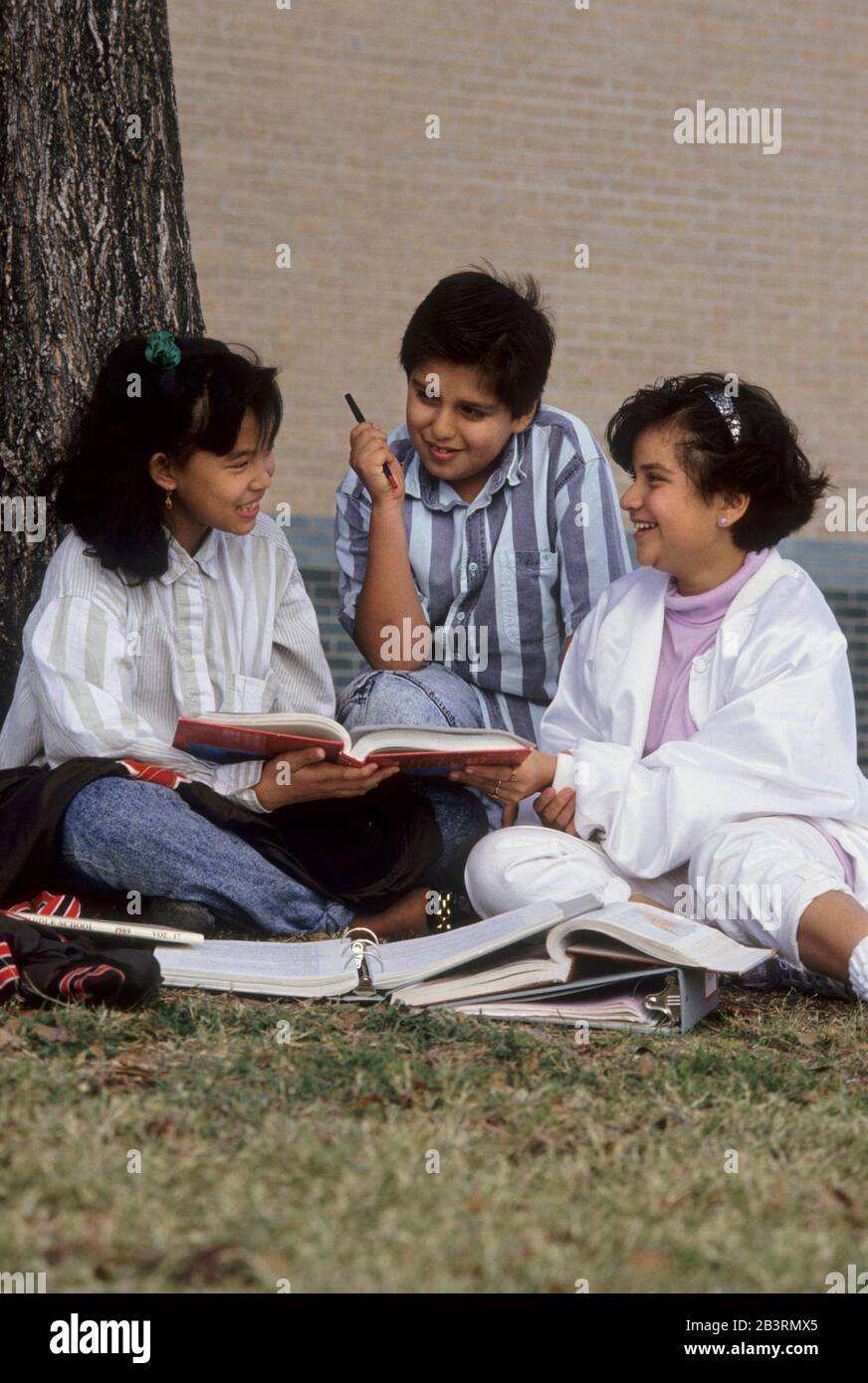 Austin Texas USA, circa 1991: Junior high school students studying ...