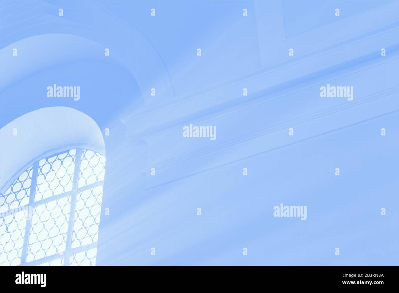 Light rays through the window. Pale blue toned photo Stock Photo - Alamy