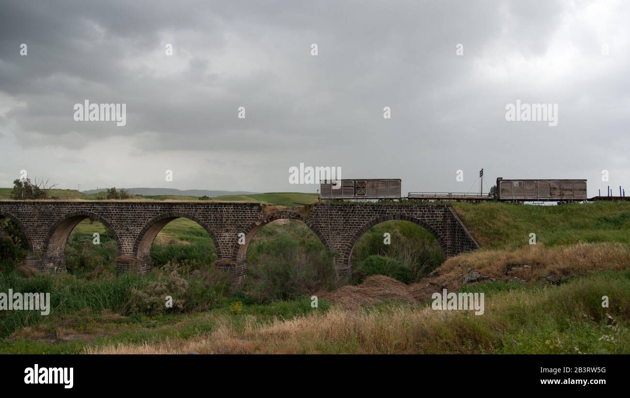 Israeli side of Jordan river ancient bridge Stock Photo - Alamy