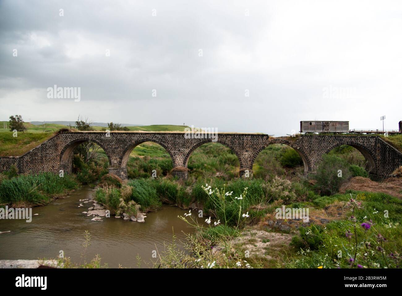 Israeli side of Jordan river ancient bridge Stock Photo - Alamy