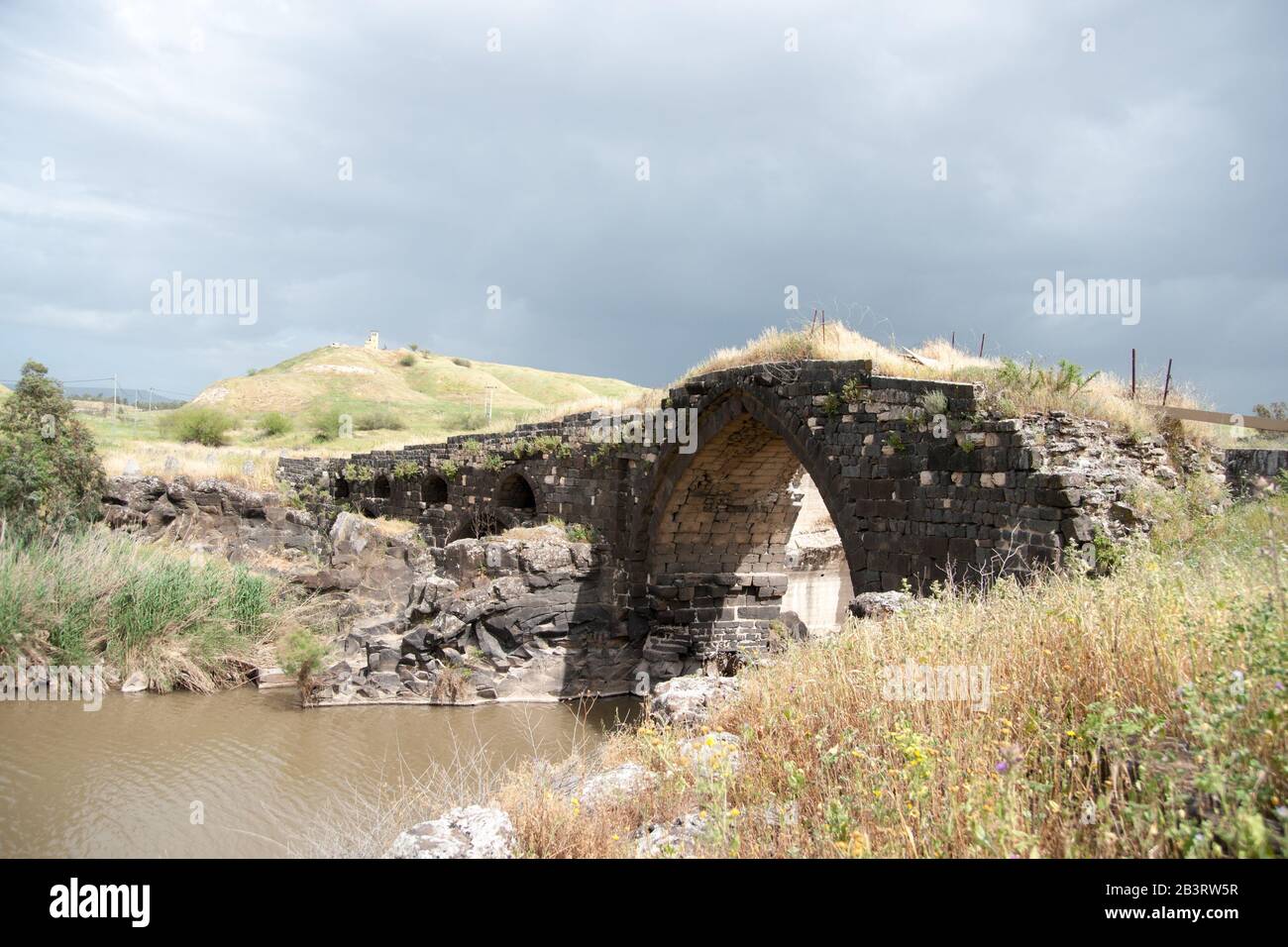 Old roman bridge over Jordan river Stock Photo - Alamy