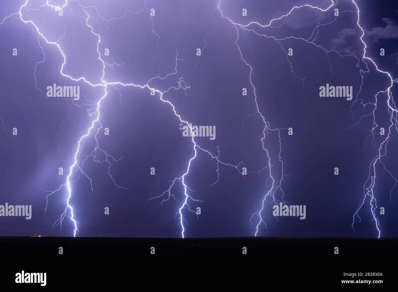 Thunderstorm lightning bolt strikes from a monsoon storm near San Simon ...