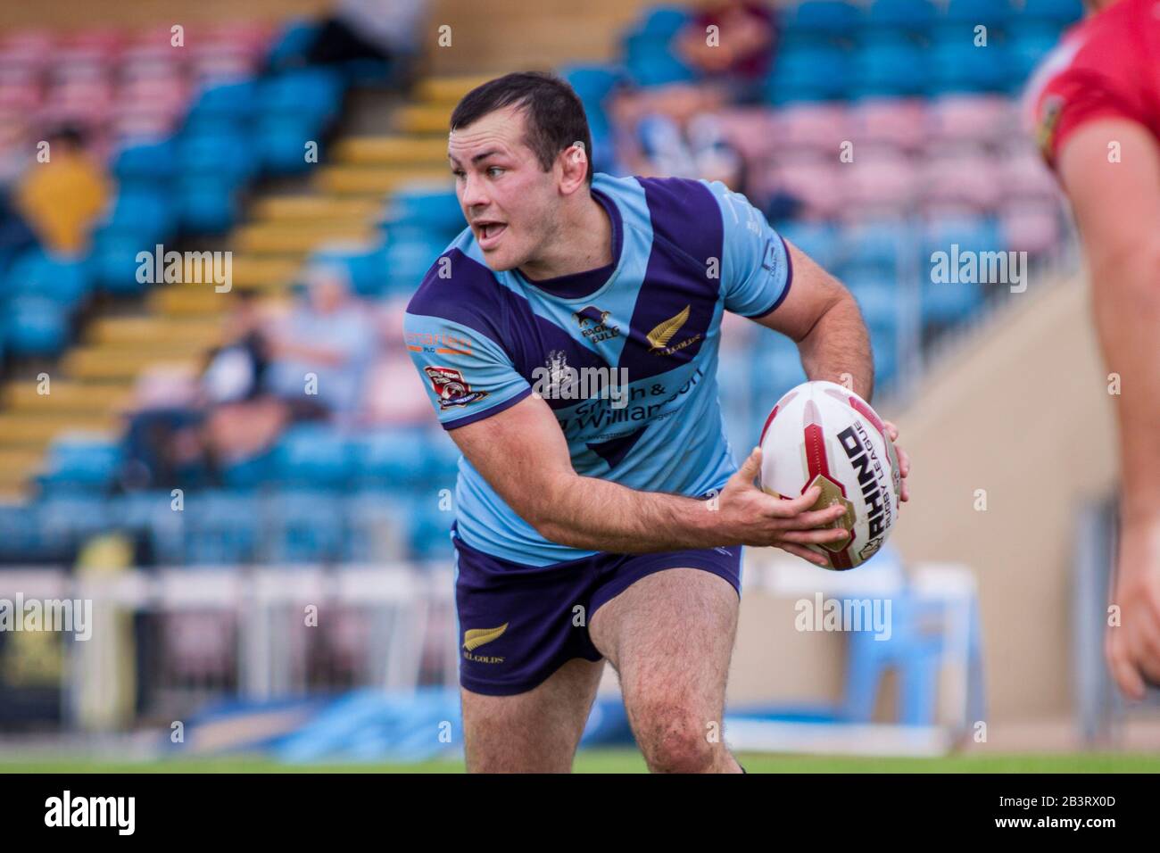 Steve Parry of the All Golds in action against North Wales Crusaders ...