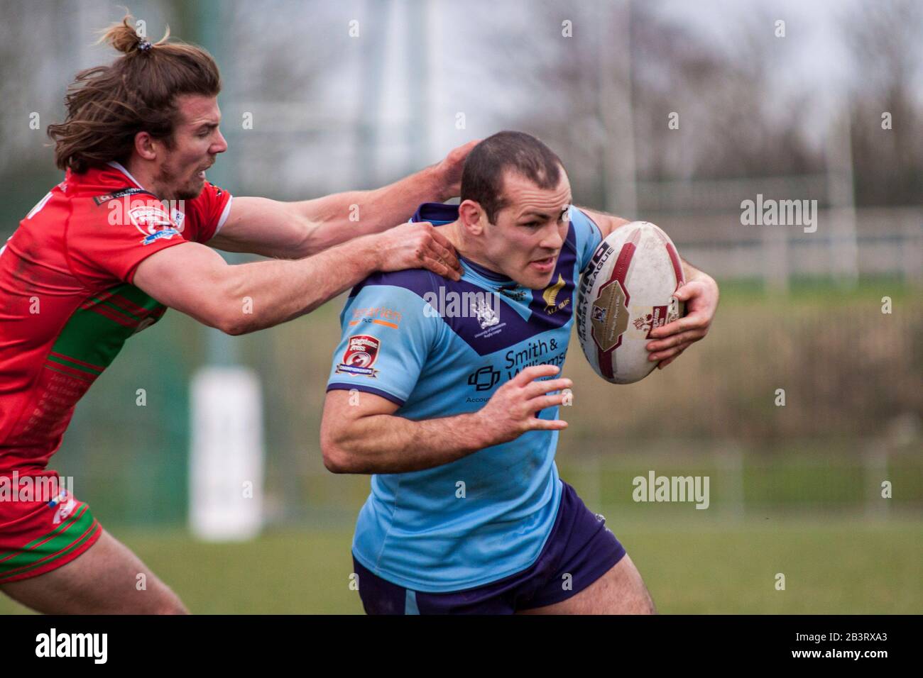 Steve Parry of the All Golds in action against North Wales Crusaders ...