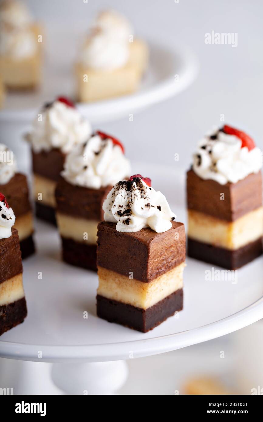 Bite sized dessert, three chocolate layer cake Stock Photo - Alamy