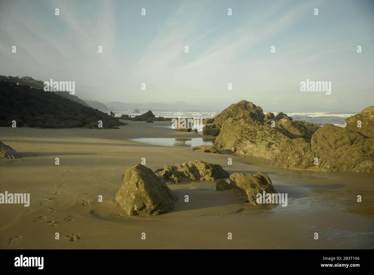 Rocks along the Basque coast under a surreal sky, pasakdek Stock Photo ...