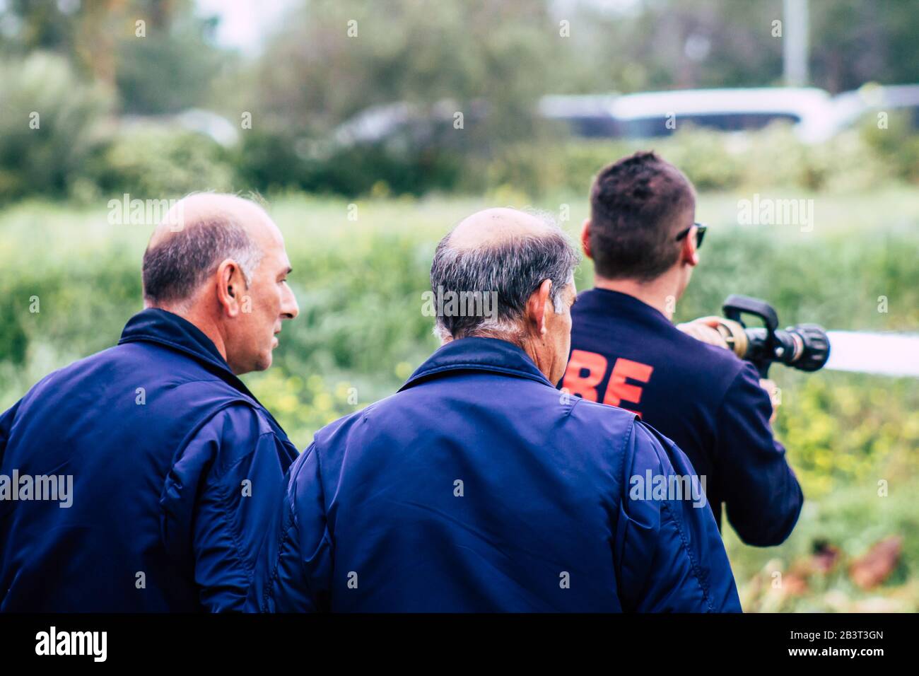 Paphos Cyprus March 04, 2020 View of a Cypriot firefighter putting out ...