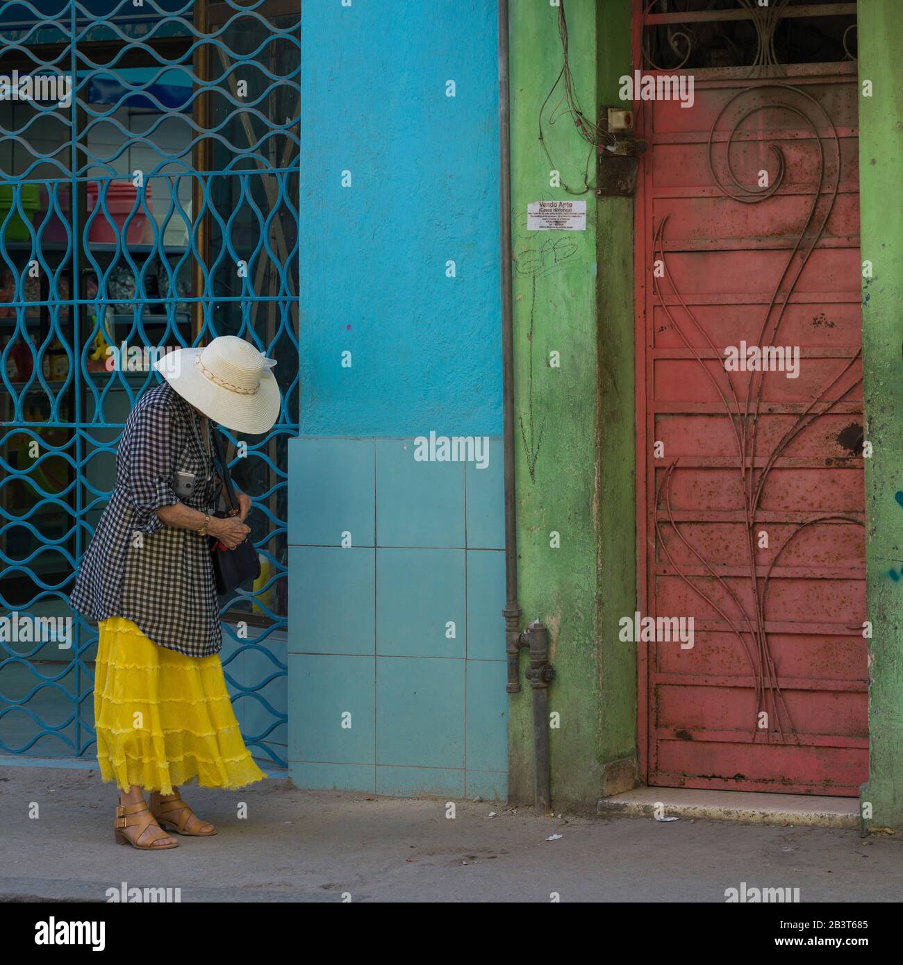 Woman standing outside a building, Havana, Cuba Stock Photo - Alamy