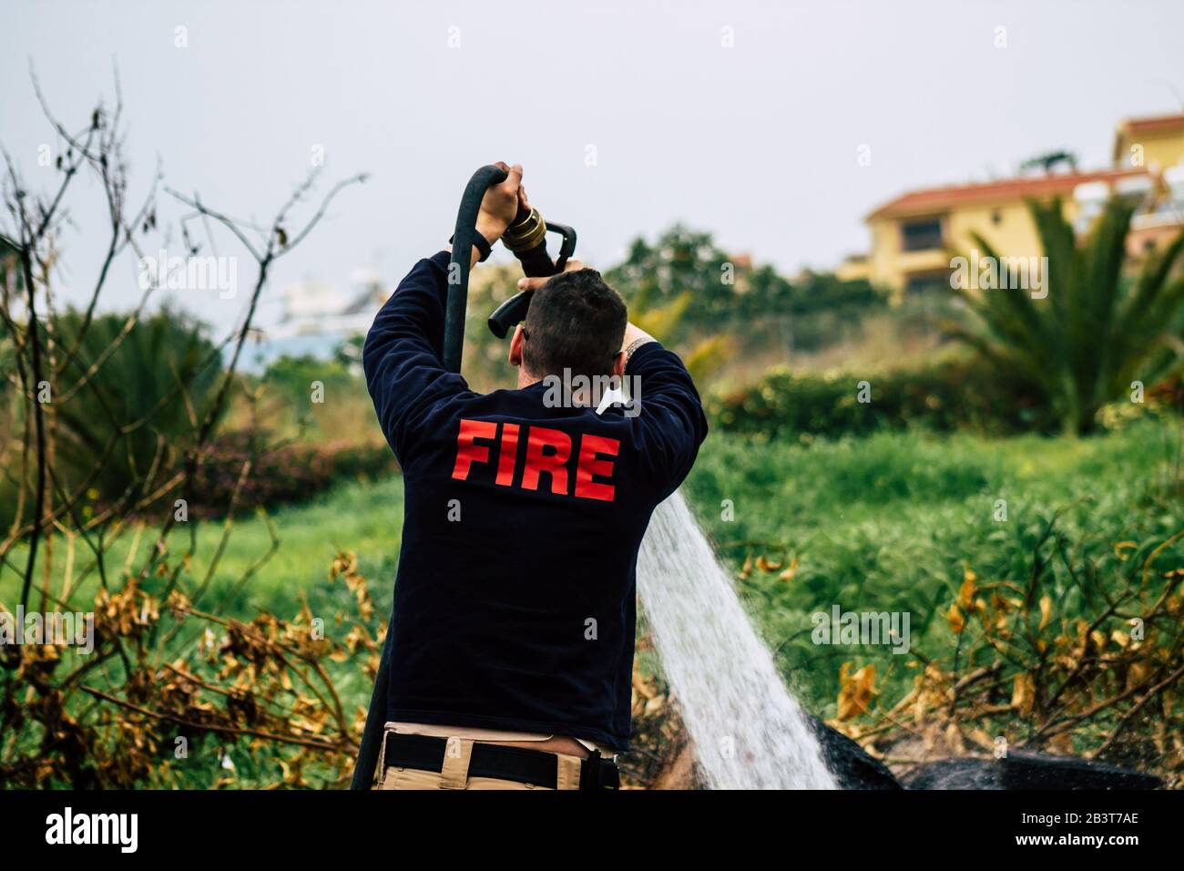 Paphos Cyprus March 04, 2020 View of a Cypriot firefighter putting out ...