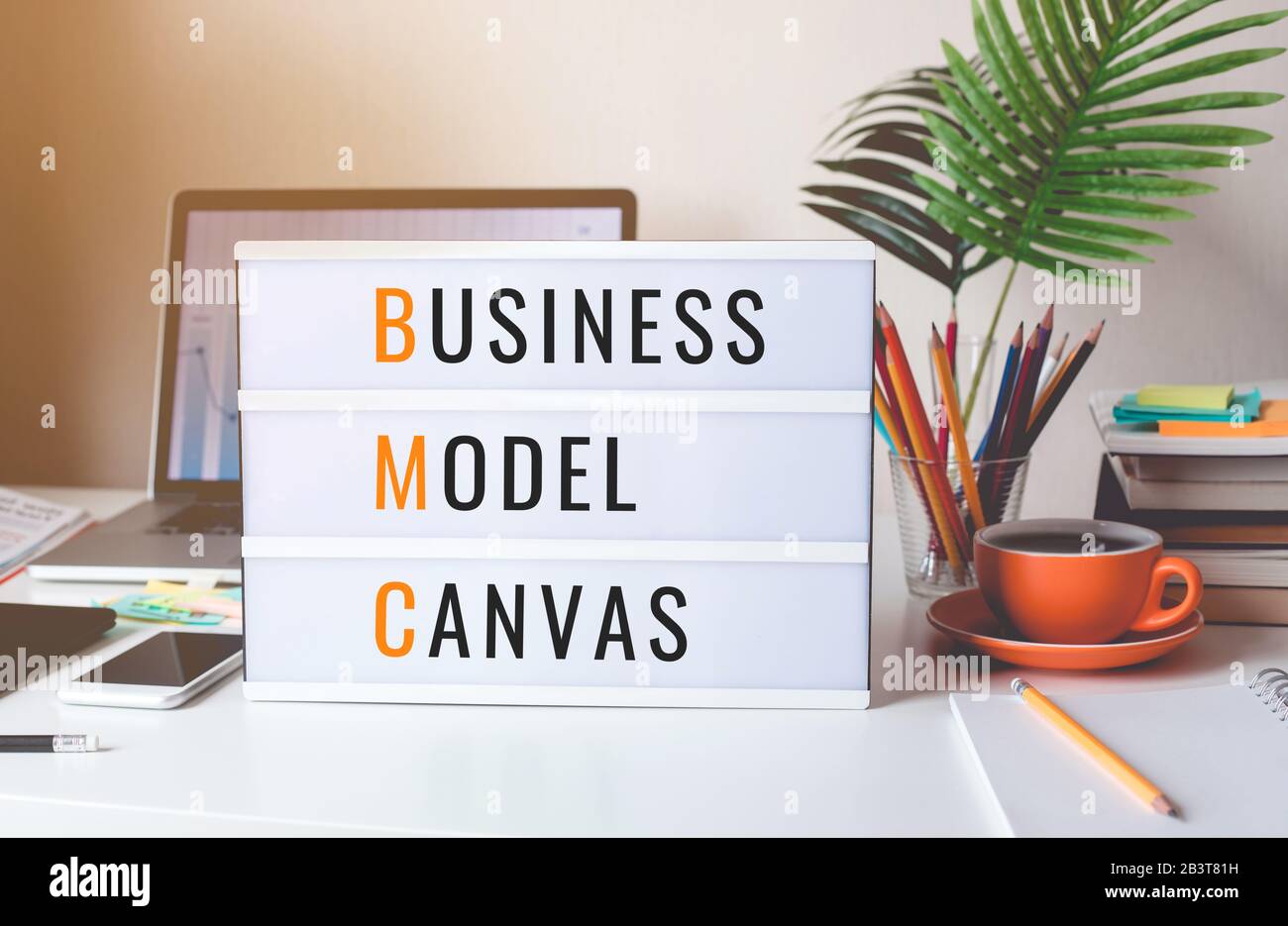 Business Model Canvas concepts with text on light box.process and ...