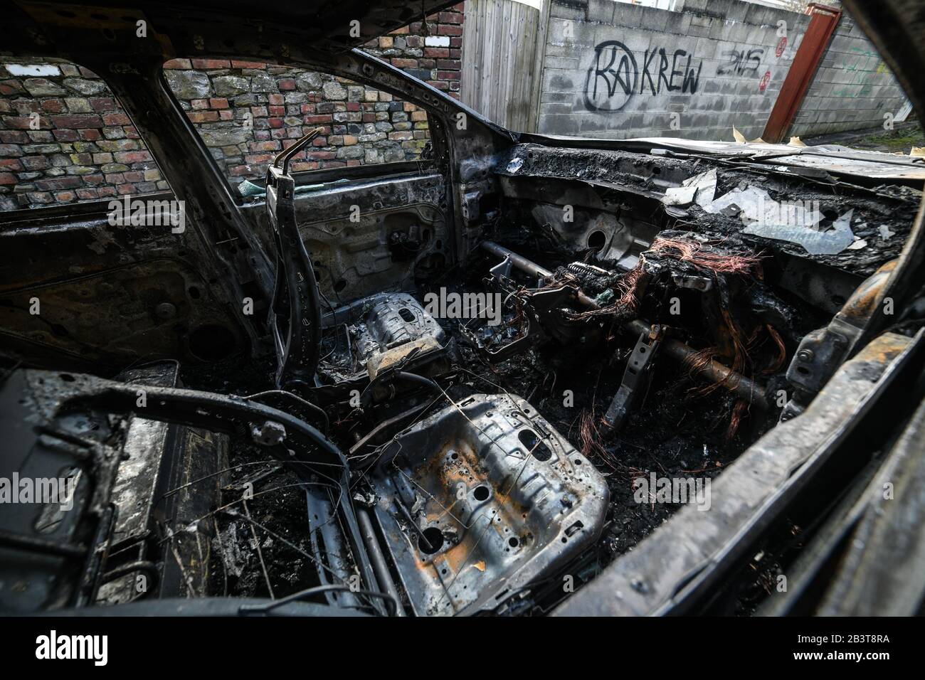 The remains of the Ford which was set alight showing a black burnt ...