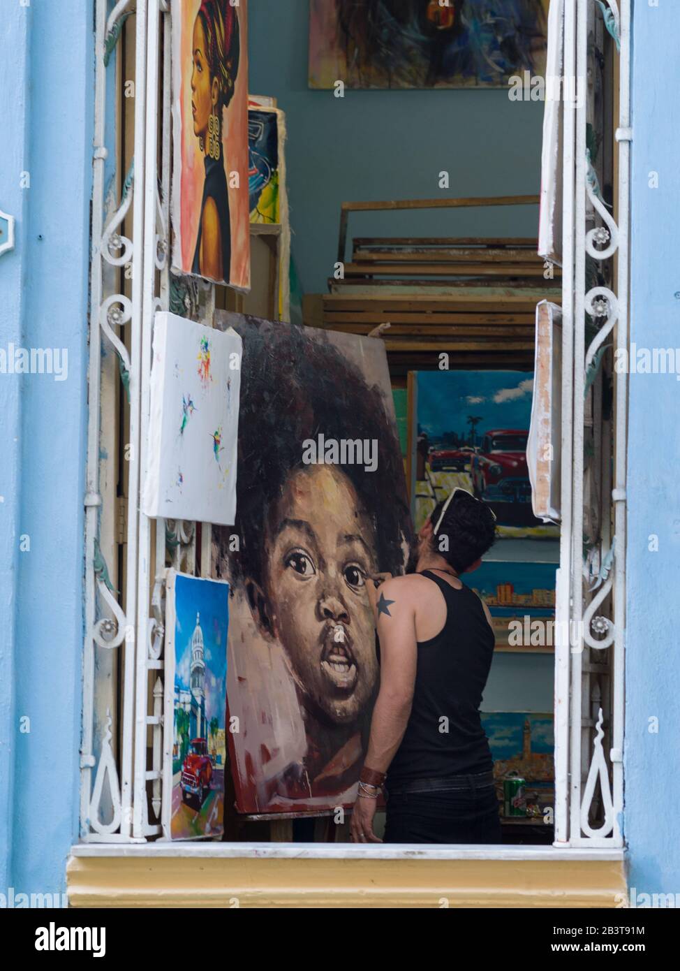 Artist drawing in a studio, Havana, Cuba Stock Photo - Alamy