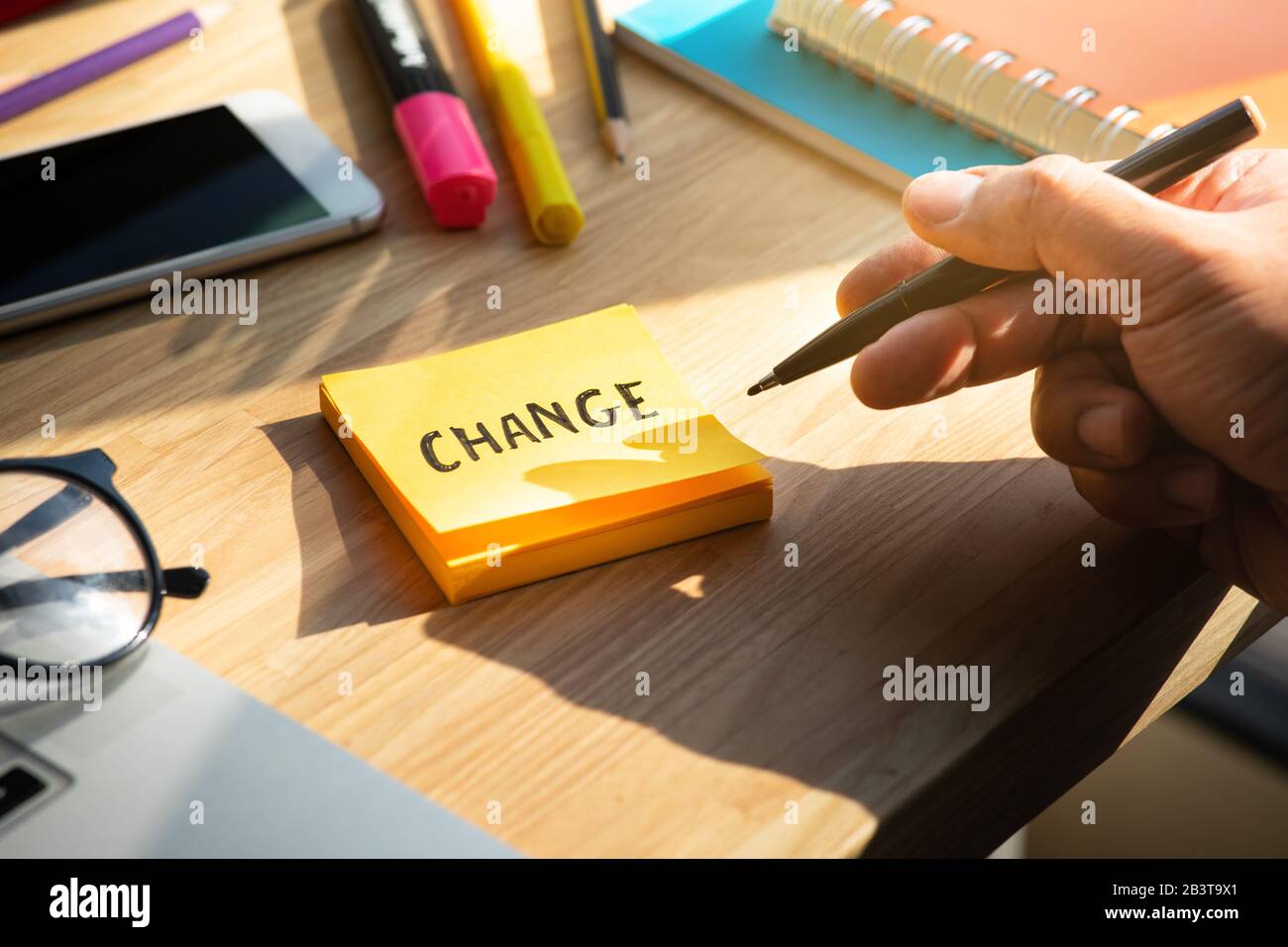 Change concepts with person writing text on notepaper.business ...