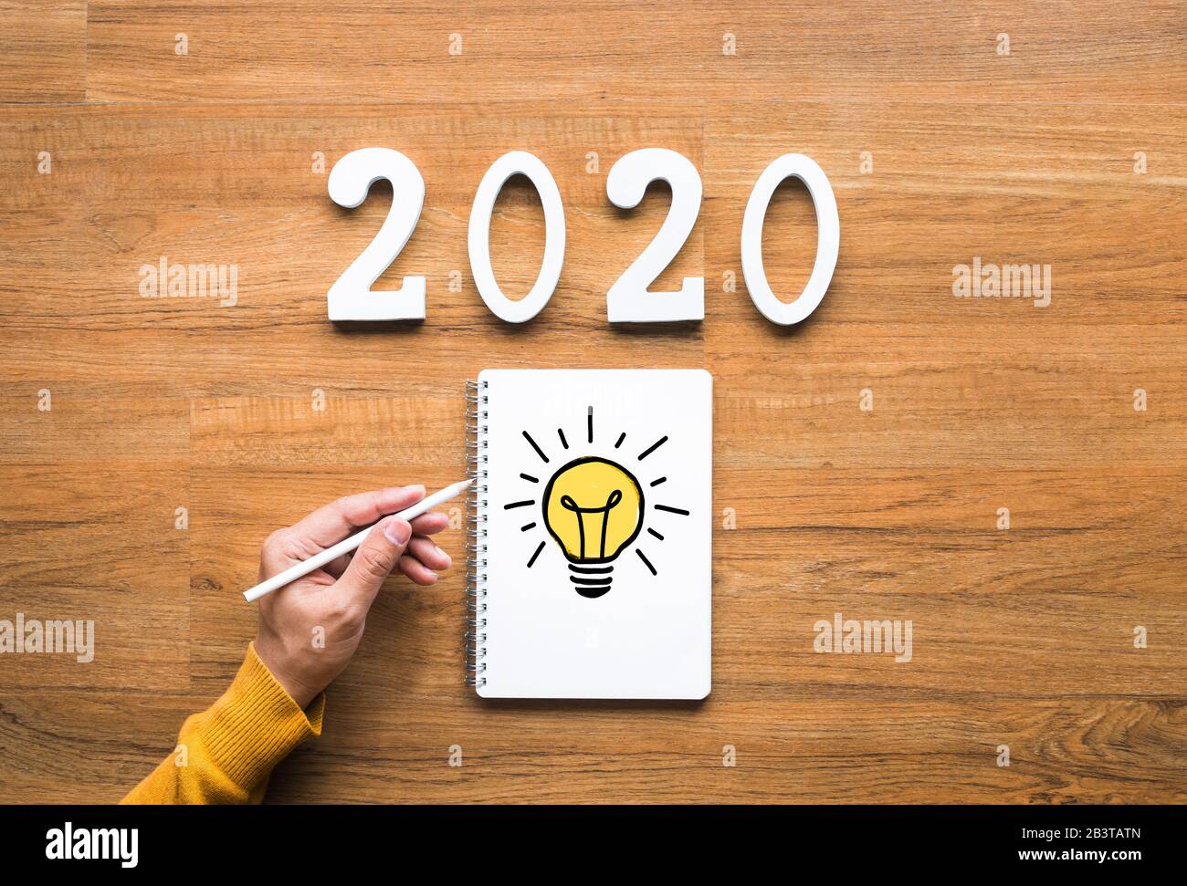 2020 creativity inspiration concepts with lightbulb on notepaper.Business ideas Stock Photo - Alamy