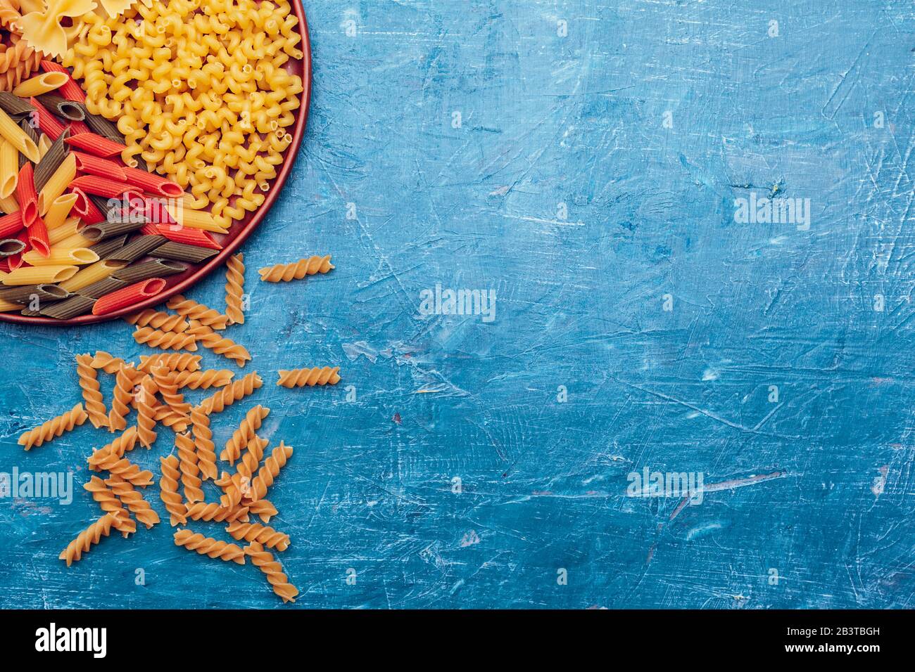 Background from various pasta close-up, top view Stock Photo - Alamy