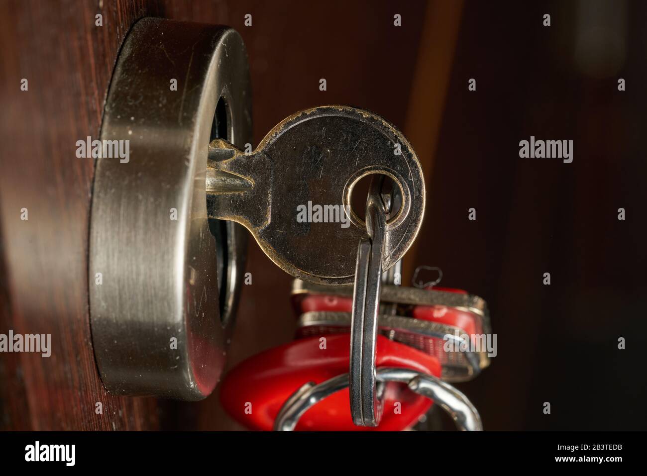 the door lock with the handle and a key Stock Photo - Alamy