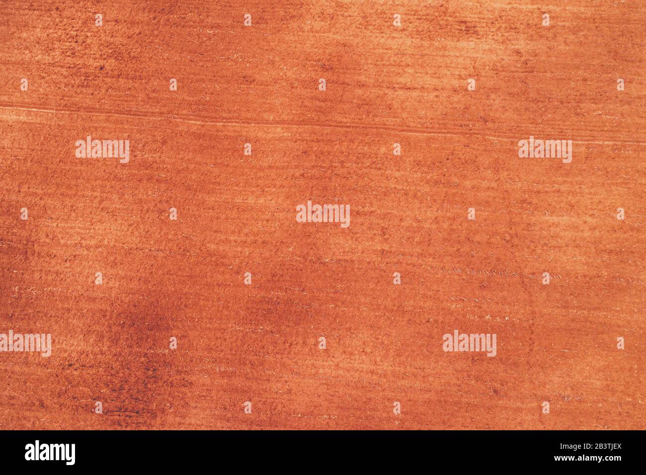 Soil texture background. Plowed field in early spring. Brown land ...