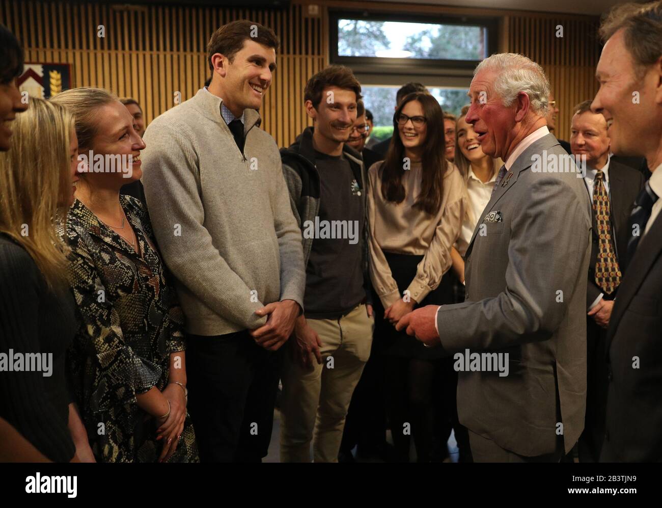 The Prince of Wales meets with students during a visit to Kellogg ...