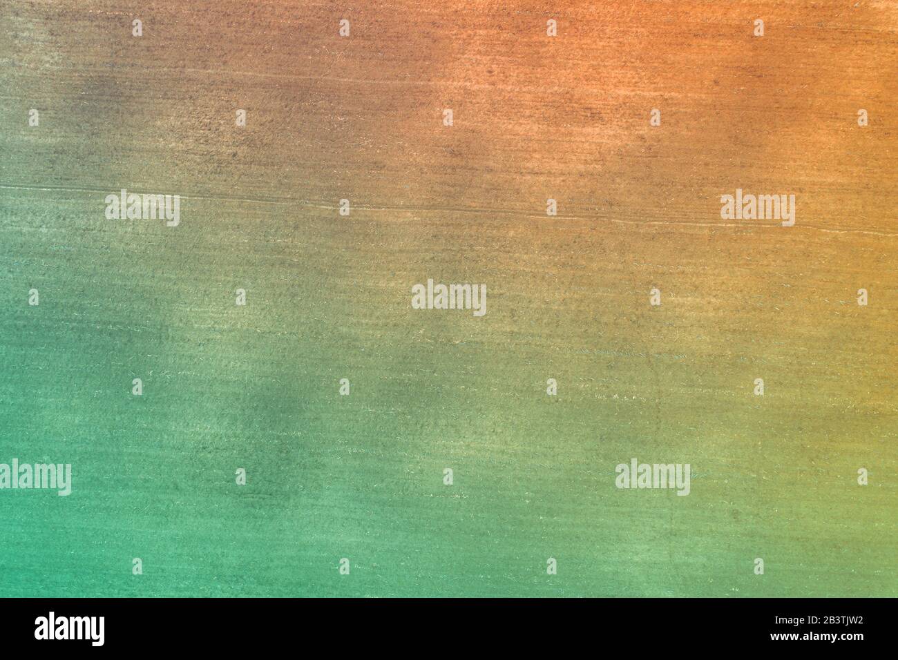 Soil texture background. A plowed field in early spring. Colorful land ...