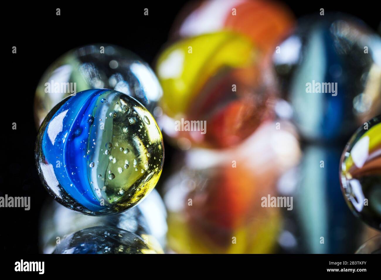 Marbles on table hi-res stock photography and images - Alamy
