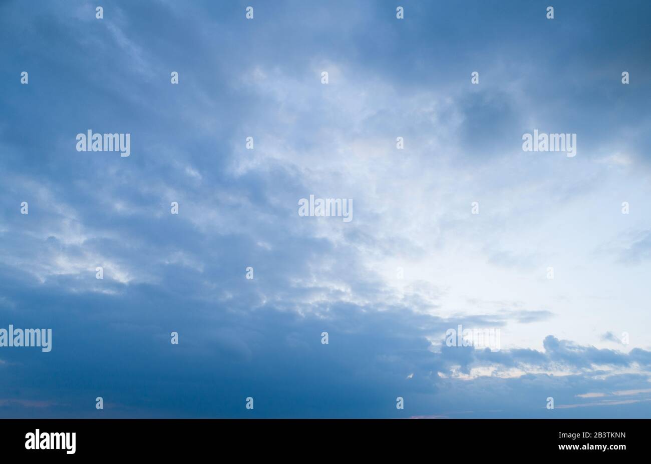 Beautiful sky with stretched clouds during twilight Stock Photo - Alamy