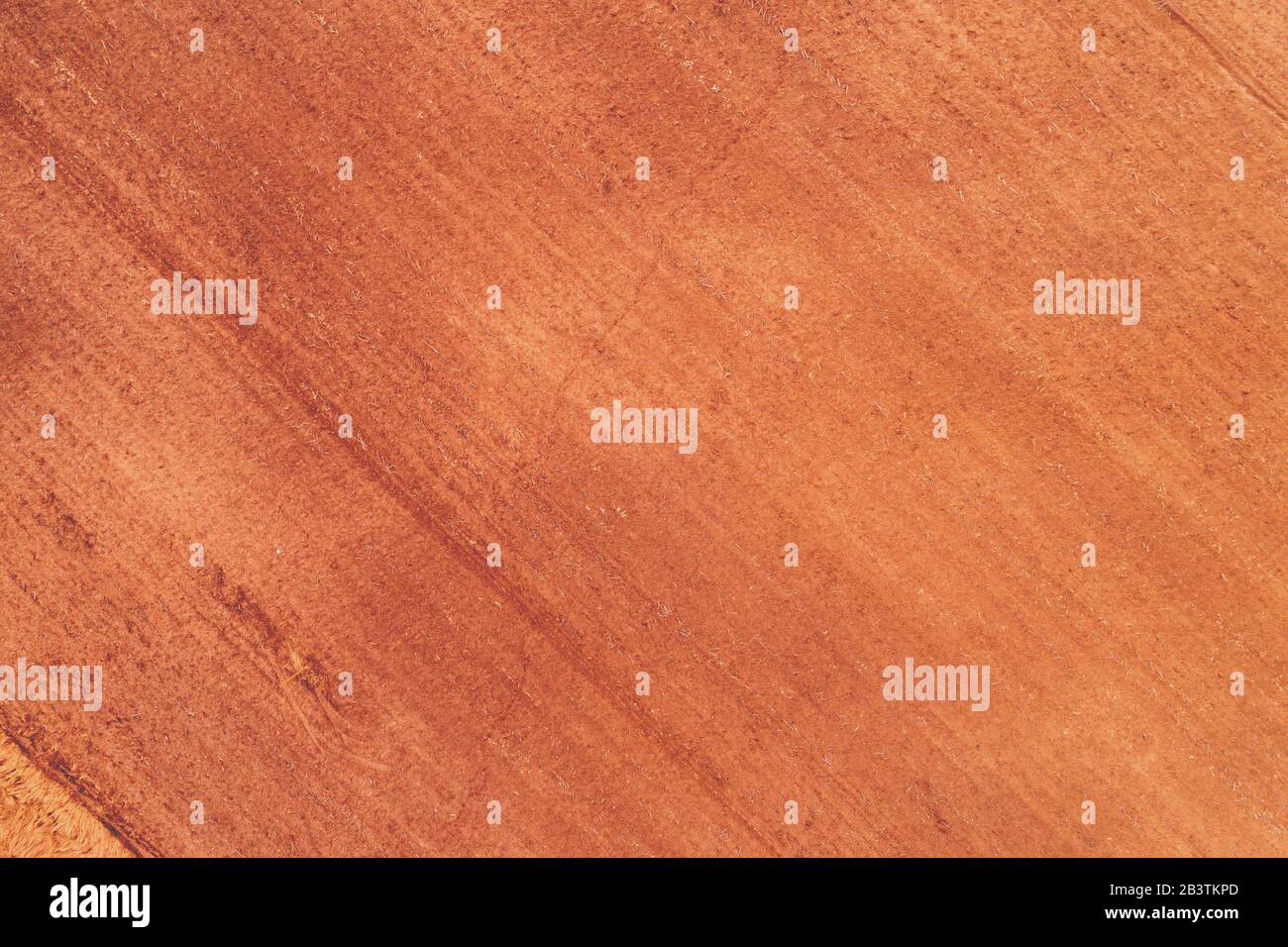 Soil texture background. Plowed field in early spring. Brown land ...