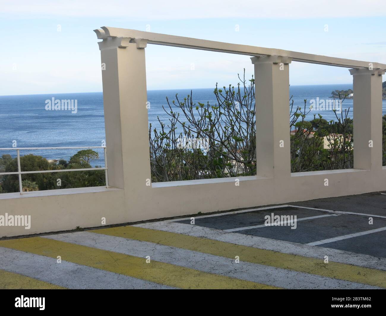 Pillars frame the view of the Mediterranean and the Cap Ferrat ...