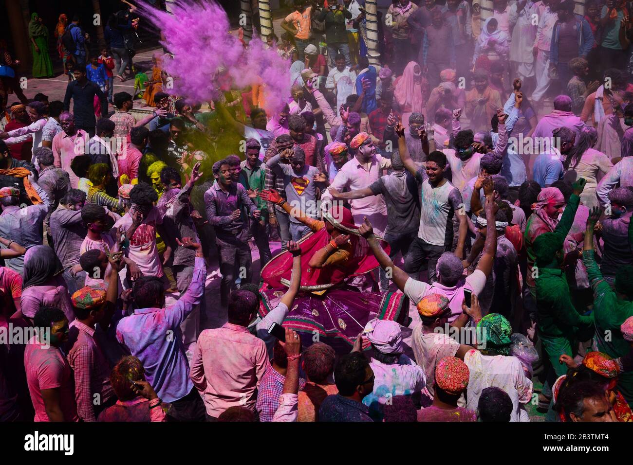 People dance as they take part during the festival.Holi Festival of ...