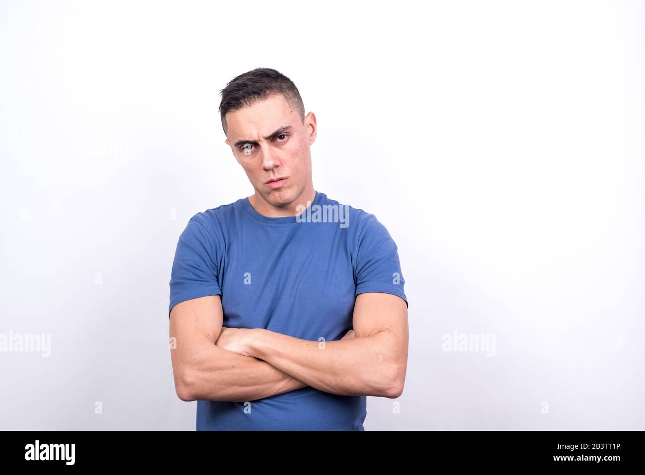 Bored man on white background, medium shot Stock Photo - Alamy