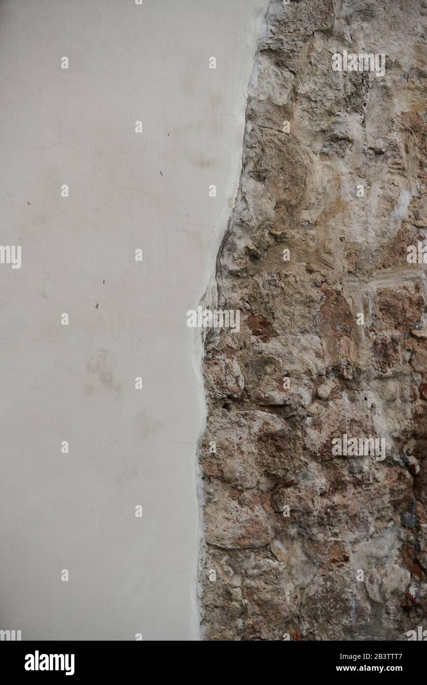 Brick through plaster hi-res stock photography and images - Alamy