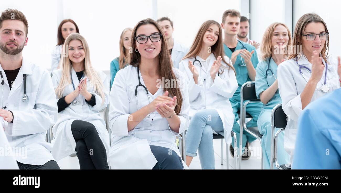 top view. a group of smiling doctors pointing at you Stock Photo - Alamy