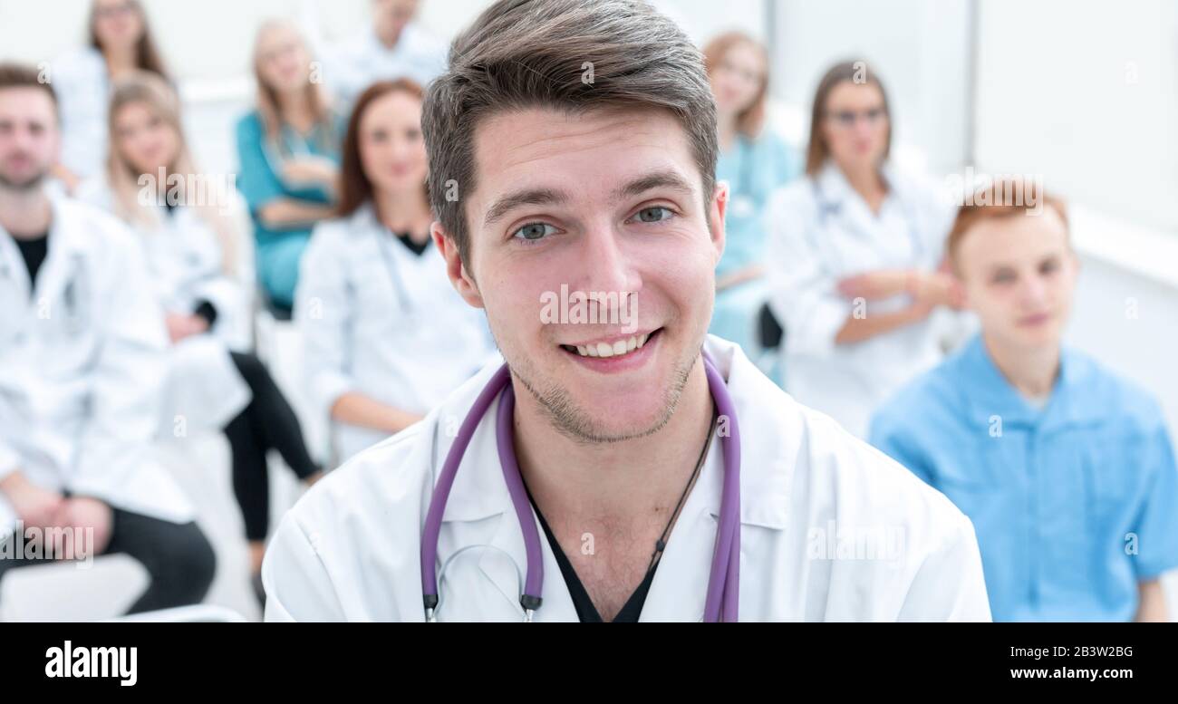 top view. a group of smiling doctors pointing at you Stock Photo - Alamy