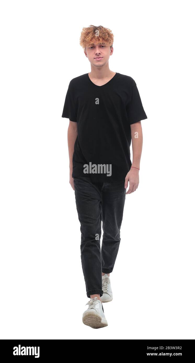 in full growth. stylish young man striding forward Stock Photo - Alamy