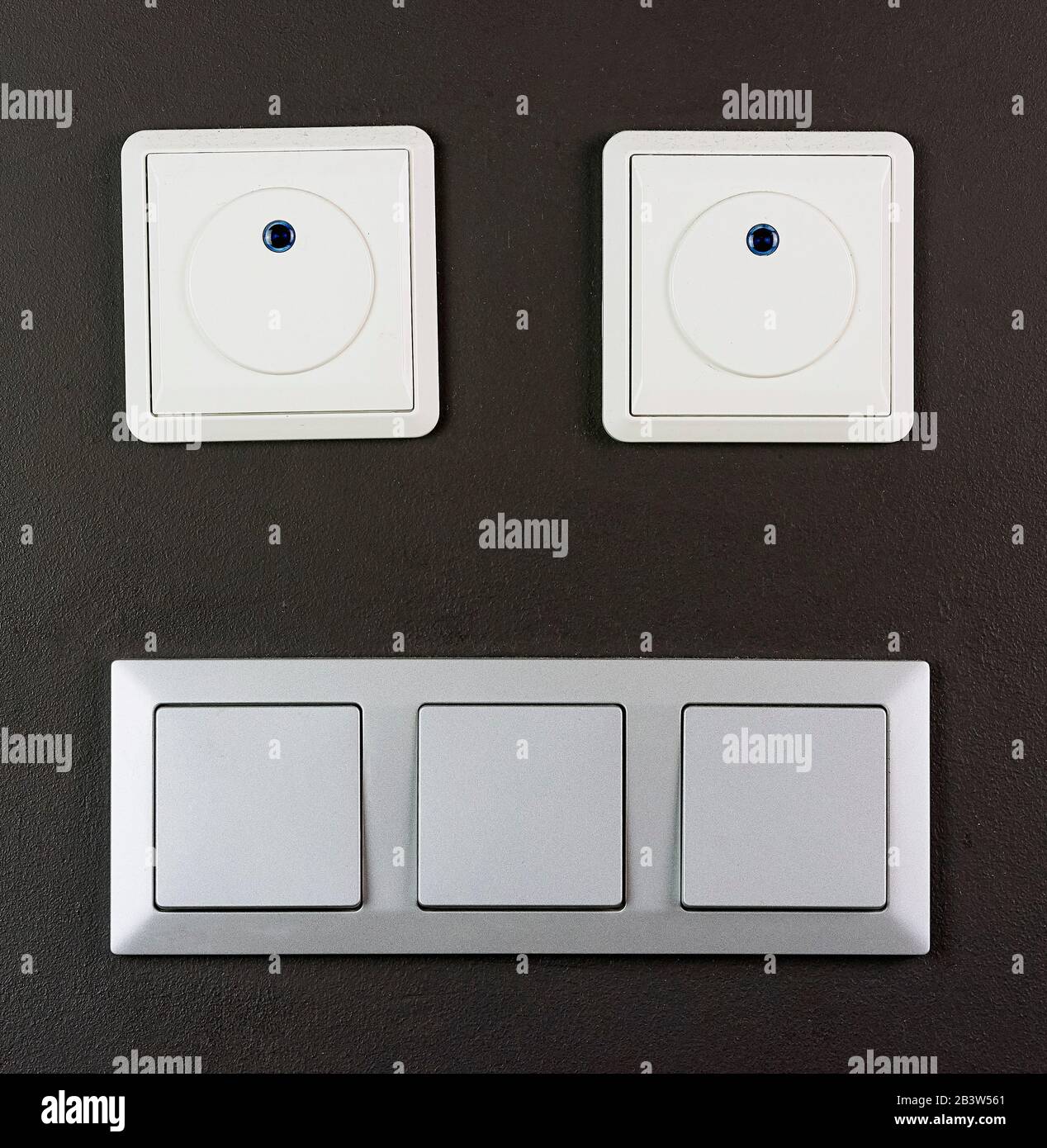 Electrical switch and plug on wall smile face Stock Photo - Alamy