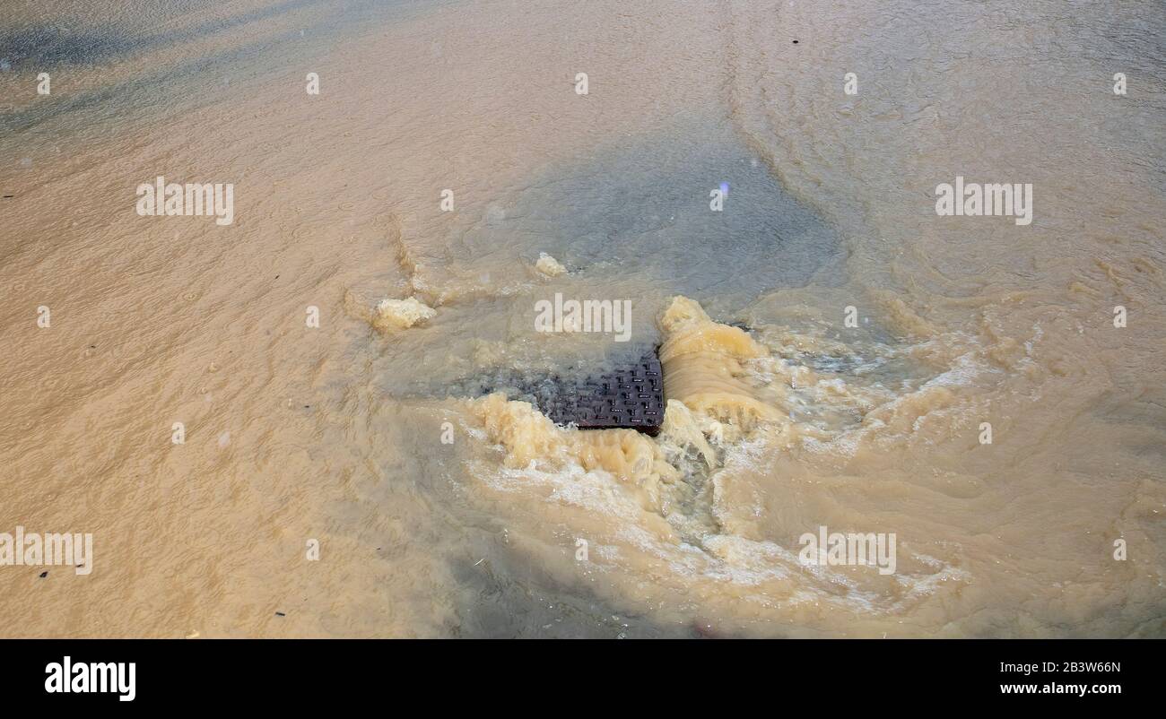 Water flooding manhole hi-res stock photography and images - Alamy