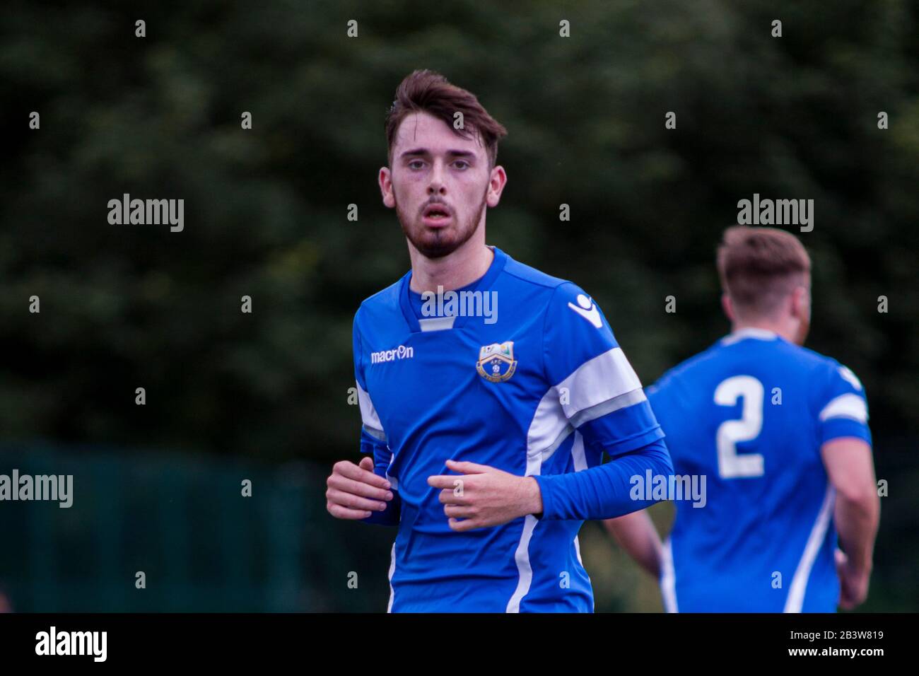Jordan Pike of Port Talbot Town in action against AFC Llwydcoed Stock ...