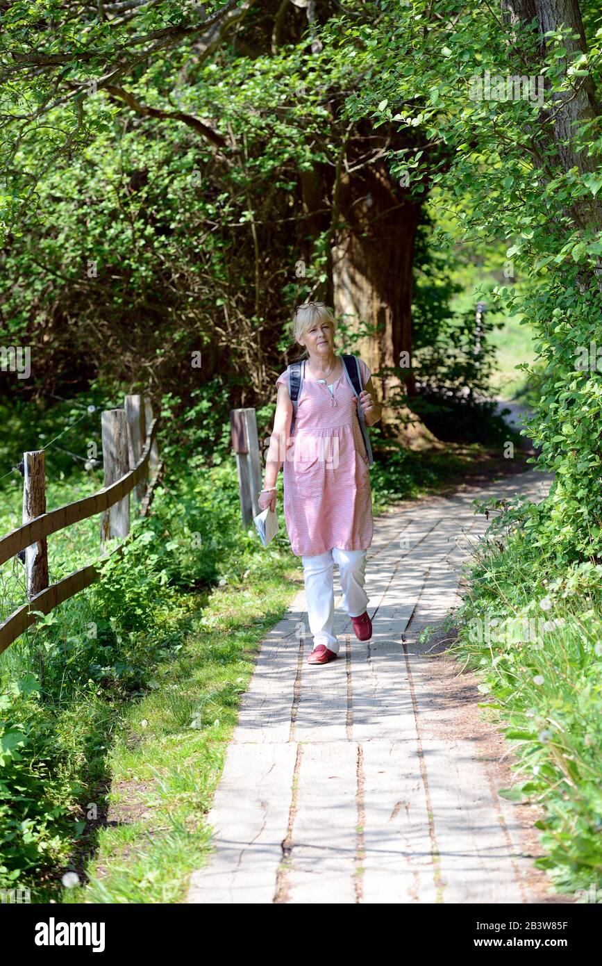 Person map fence hi-res stock photography and images - Alamy