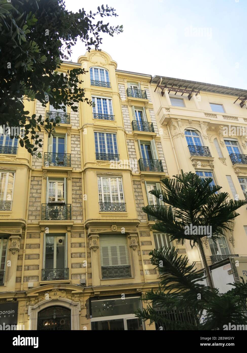 A Mediterranean style of architecture with wooden shutters at all the ...