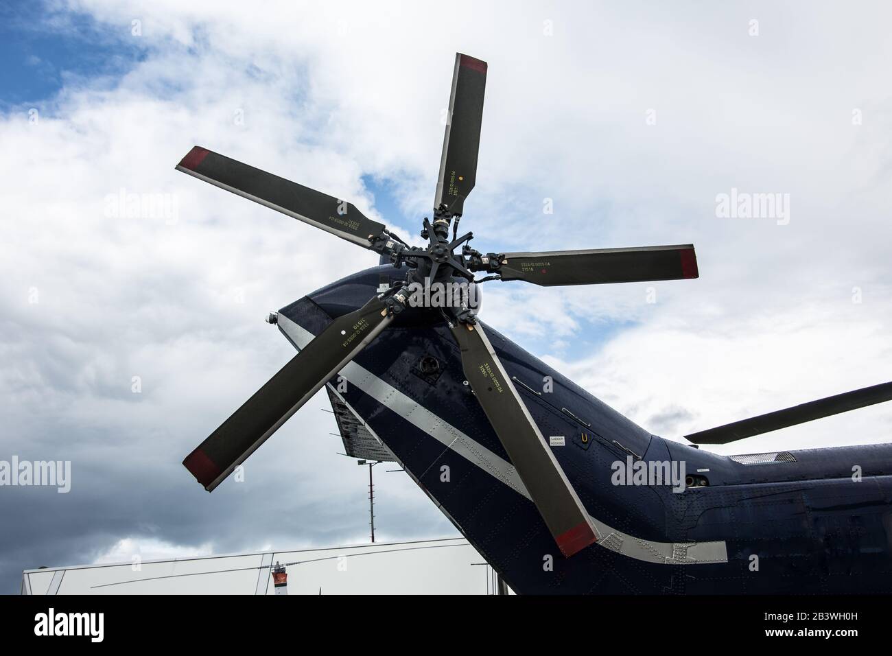 Tail rotor of a helicopter against a blue sky Stock Photo - Alamy